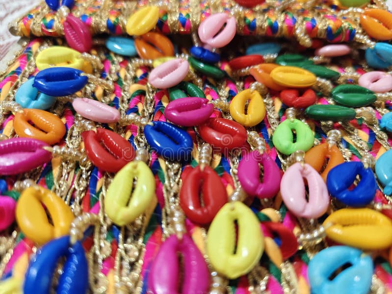 Colorful Shell and Bead Details with Lace Backdrop Stock Image - Image ...
