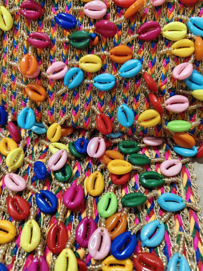 Colorful Shell and Bead Details with Lace Backdrop Stock Image - Image ...