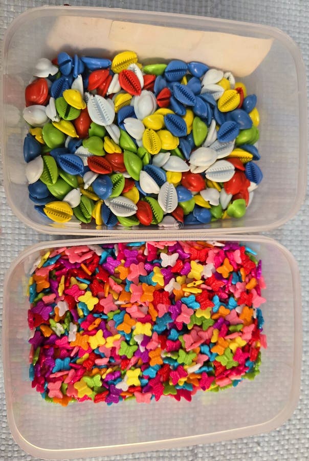 Colorful Shell and Butterfly Beads in Plastic Boxes Stock Image - Image ...