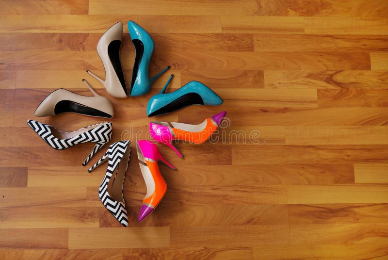 Colorful Shoes on a Wooden Floor Stock Photo - Image of fashion, color ...
