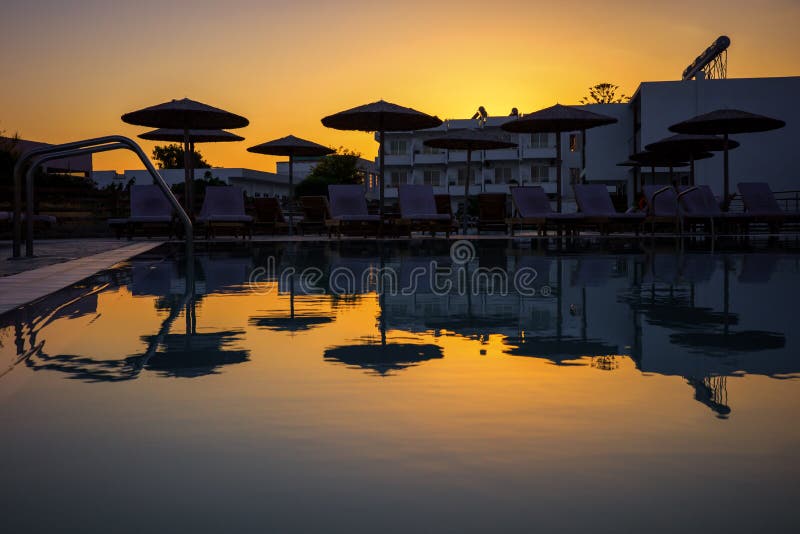 Colorful Sky during Sunset Over Empty Swimming Pool at Hotel Resort ...