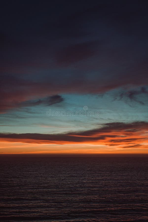 The Colorful Sky During A Sunset In The Spanish Beaches Stock Photo ...