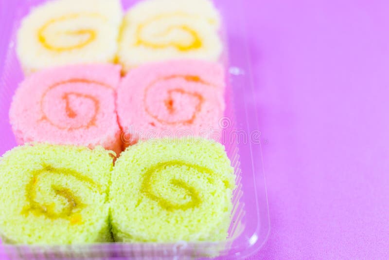 Colorful slice roll cake stock photo. Image of cream - 41451840