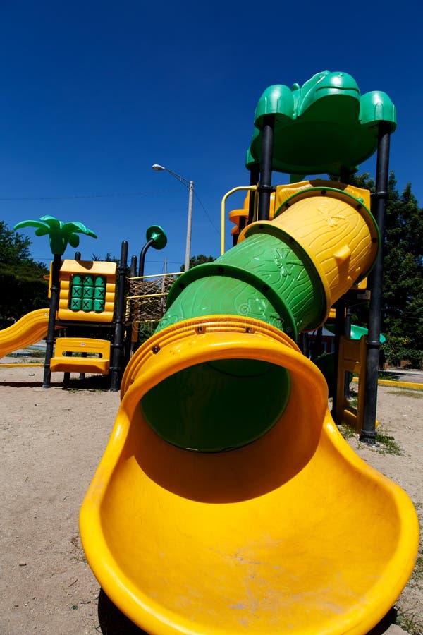 Colorful Slide in a Playground for Children Stock Photo - Image of park ...