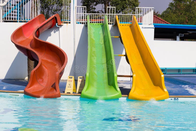 Colorful Slider beside Swimming Pool Stock Image - Image of aqua ...
