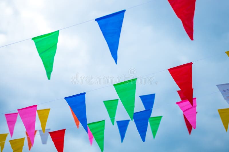 Colorful Small Flags with Cloudy Sky Background. Stock Photo - Image of ...