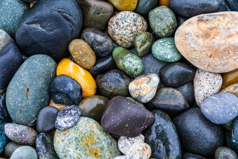 Colorful Smooth Rocks on the Beach Stock Photo - Image of natural ...