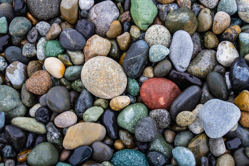 Colorful Smooth Rocks on the Beach Stock Image - Image of colorful ...
