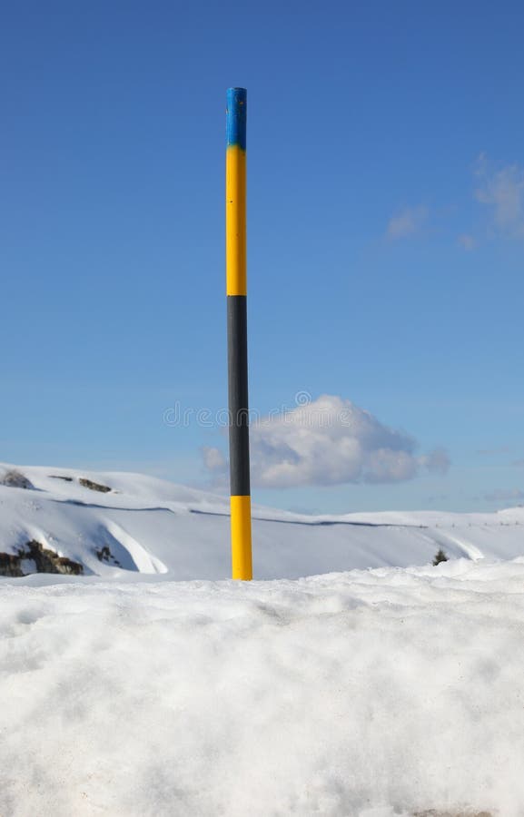 Snow Warning Post during Snowfall in the Mountains in Winter Stock ...