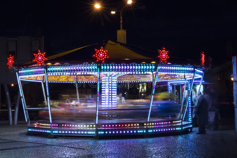 Spinning carousel lights stock image. Image of turn - 106001655