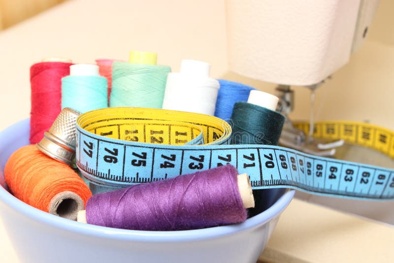 Colorful Spools of Thread, Tape Measure and Thimble Stock Image - Image ...
