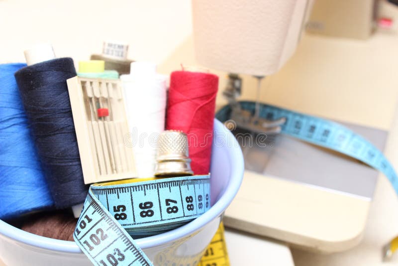 Colorful Spools of Thread, Tape Measure and Thimble Stock Photo - Image ...