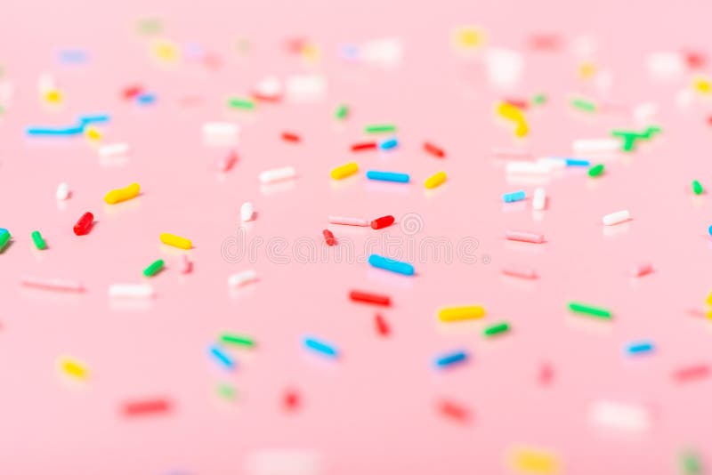 Colorful Sprinkles Over Pink Background, Decoration Stock Photo - Image ...