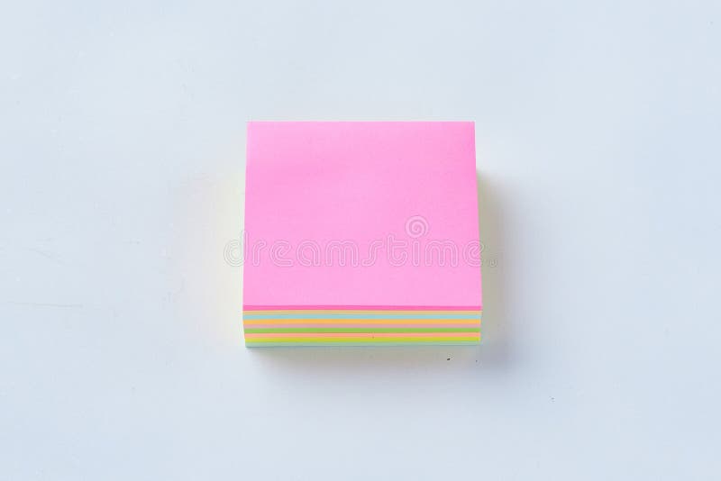 Colorful Stack of Sticky Notes Arranged Neatly on a White Surface in a ...