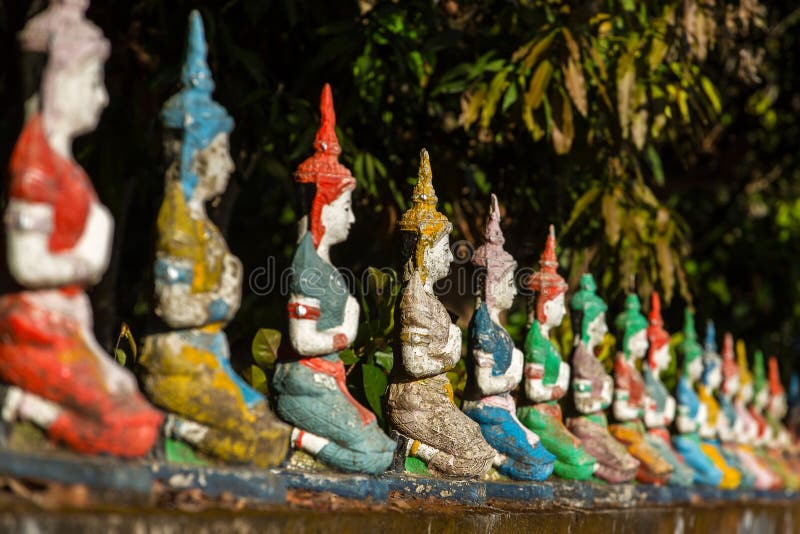 Colorful Statues on the Wall of a Buddhist Temple Stock Image - Image ...
