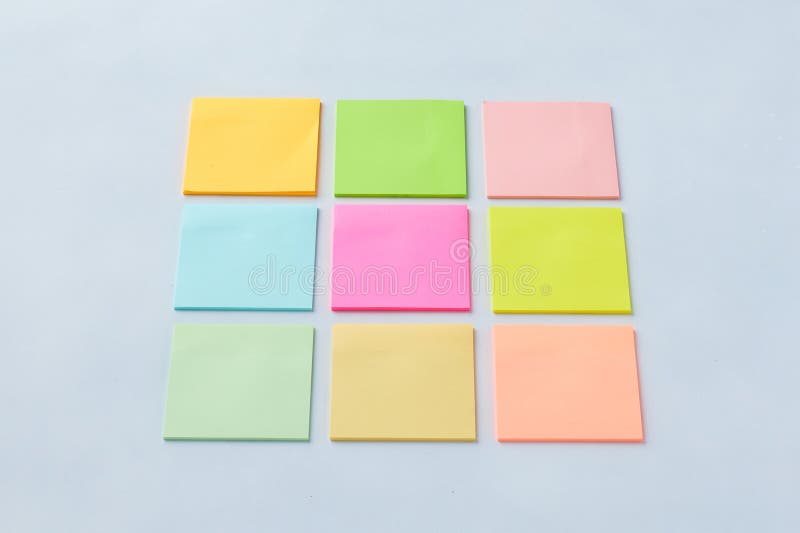 Colorful Sticky Notes Arranged in a Grid Pattern on a Light Background ...
