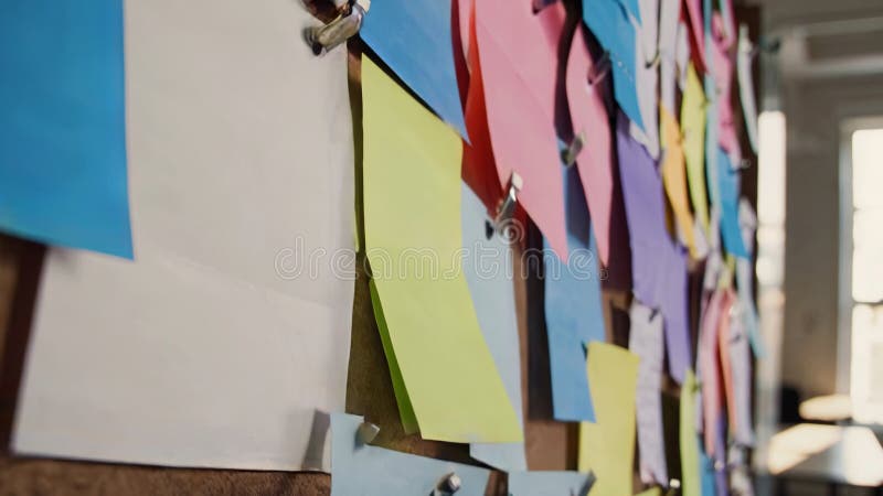 Colorful Sticky Notes with Handwritten Text are Attached To a Corkboard ...