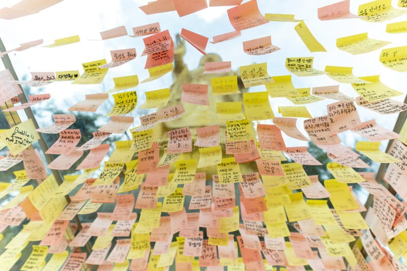 Colorful Sticky Notes with Japan Texts Stuck at the Transparent Glass ...