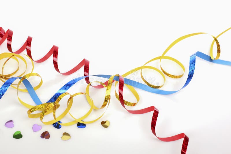 Colorful Streamers and Confetti on White Table Close Up Stock Photo ...