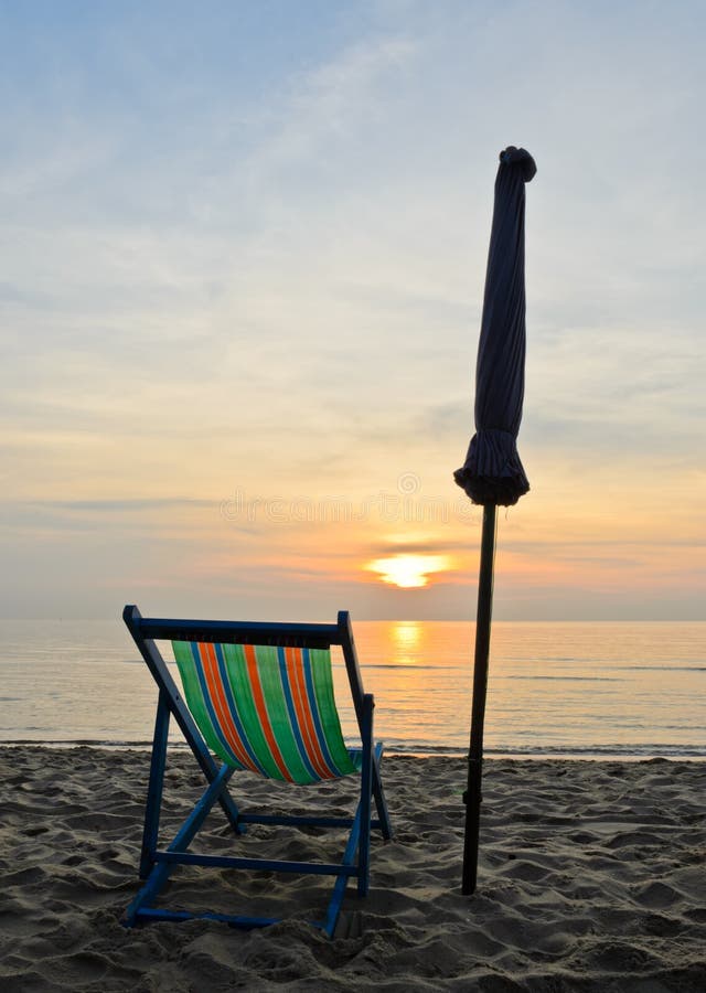 Colorful Sunrise with Beach Chair Stock Image - Image of summer ...