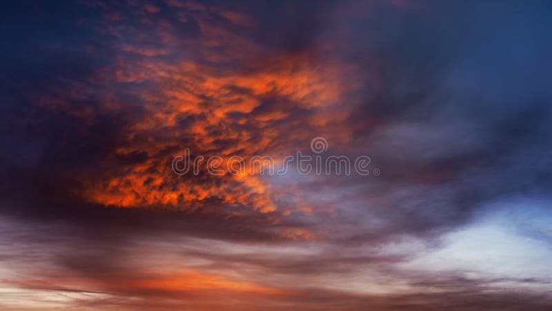Colorful Sunset Clouds with Fiery Red Cloud Stock Photo - Image of ...