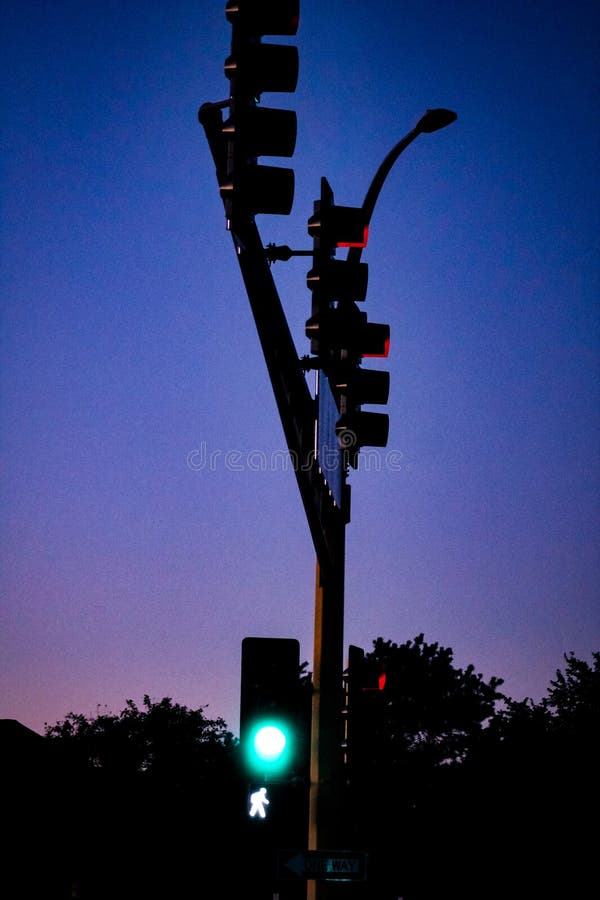Stoplight at Street Intersection at Night with Pedestrian Walk Signal ...