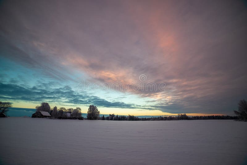 Colorful Sunset Light Over Fields of Snow in Winter Stock Photo - Image ...