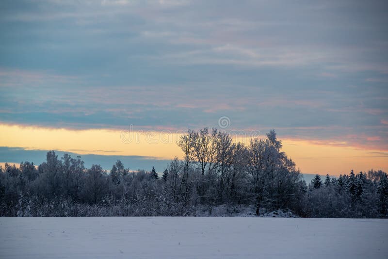 Colorful Sunset Light Over Fields of Snow in Winter Stock Image - Image ...