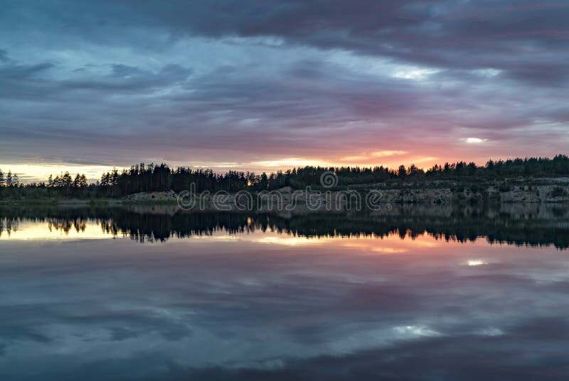 Colorful Sunset with a Mirror Reflection in a Forest Lake . Stock Photo ...