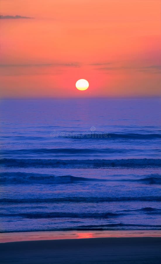 Colorful Sunset Over the Ocean Shore Stock Image - Image of waves ...