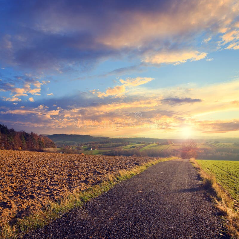 Colorful sunset over road stock image. Image of blue - 45376747