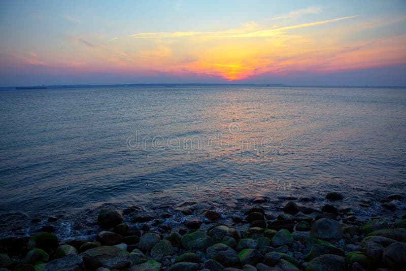 Dawn over the sea stock photo. Image of calmness, scene - 170537258