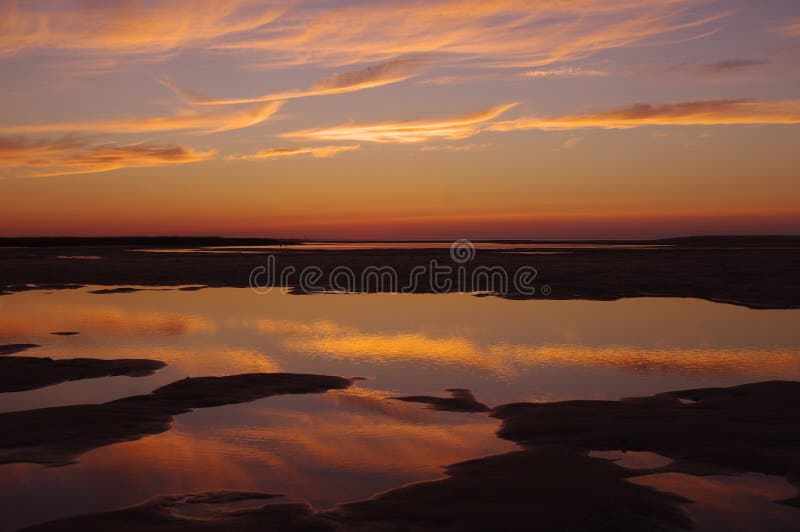Reflected Sunset Over Tidal Pools Stock Photo - Image of beach, ocean ...