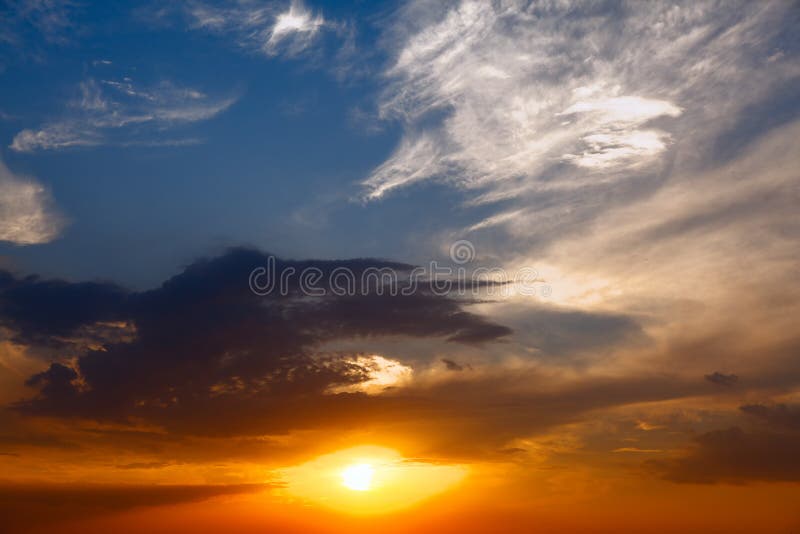 Sunset with dark clouds stock photo. Image of romantic - 231294438