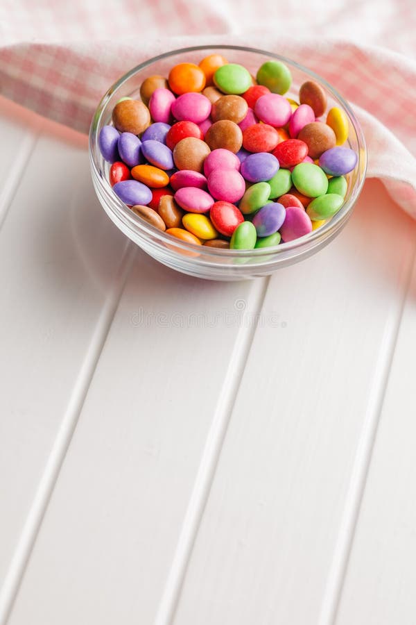 Colorful Sweet Candies in Bowl on White Table Stock Image - Image of ...