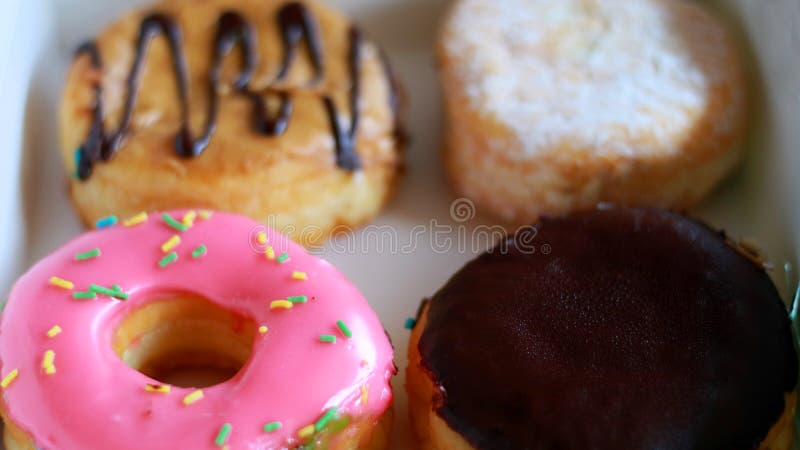 Colorful doughnuts stock photo. Image of sprinkles, delicious - 127498780