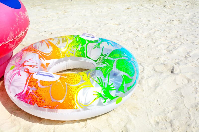 Colorful Swim Ring on White Sand Stock Photo - Image of nature, summer ...