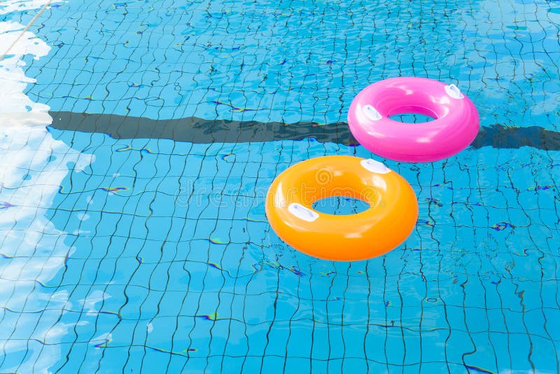 Colorful Swimming Pool Rings Stock Photo - Image of buoy, equipment ...