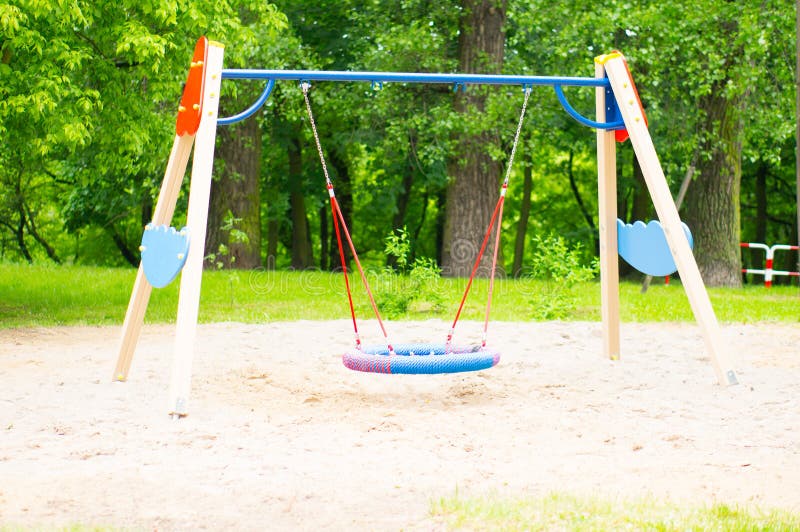 Colorful swing stock photo. Image of park, colorful, sand - 40758102