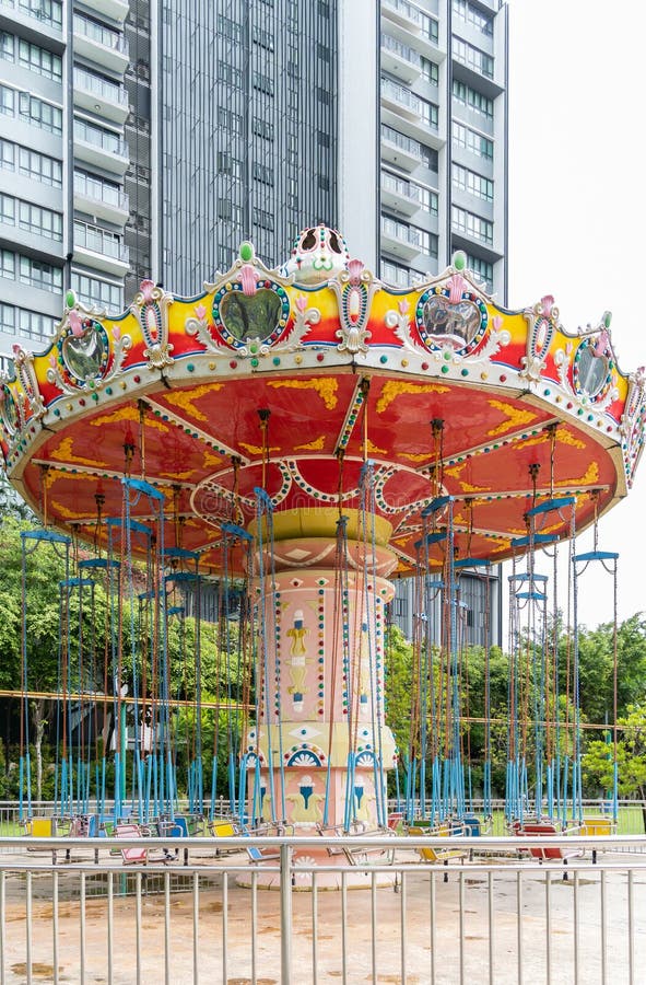 Colorful Swing Ride at the Amusement Park Stock Image - Image of ...