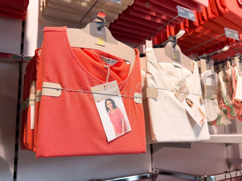 Colorful T-shirts on Display in Clothing Store Editorial Image - Image ...