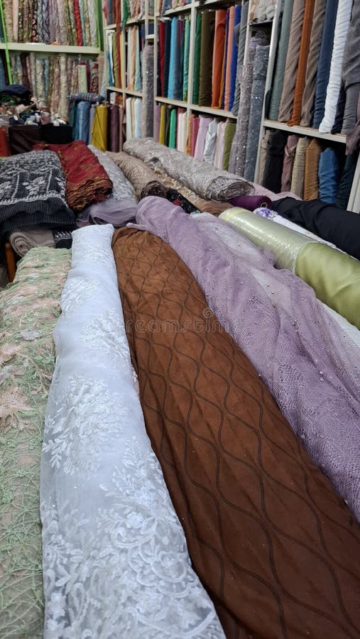 A Colorful Textile Haven: Fabrics of Elegance and Style Stock Image ...