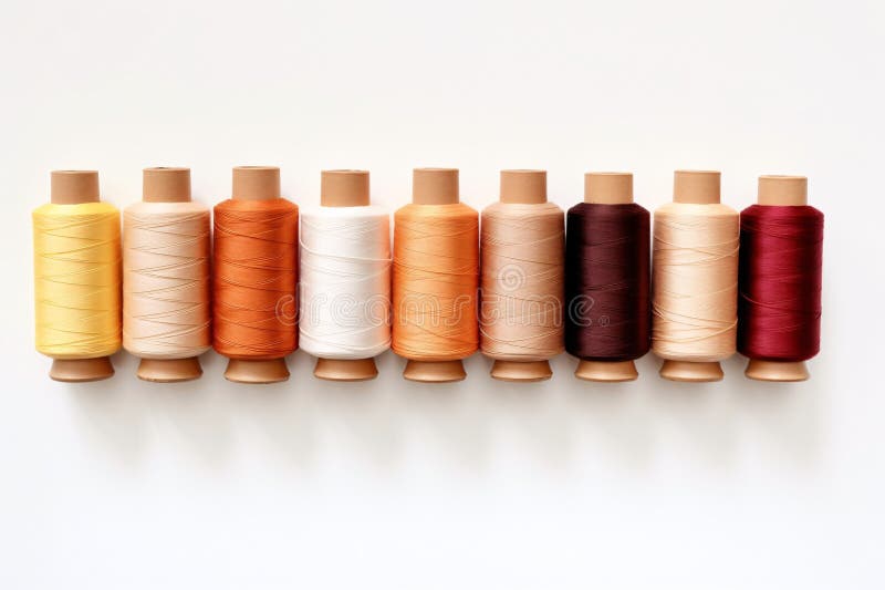 Colorful Thread Spools in Closeup Shot, Showcasing Multi-Color Bobbins ...