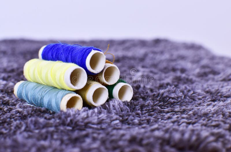 Colorful Thread Spools Used in Fabric and Textile Industry. Multicolor ...