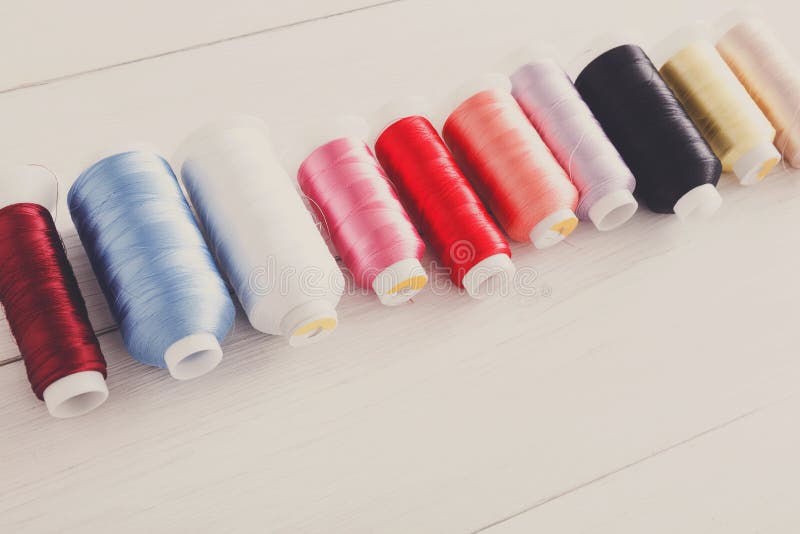 Colorful Thread Spools on Wooden Table Close Up Stock Image - Image of ...
