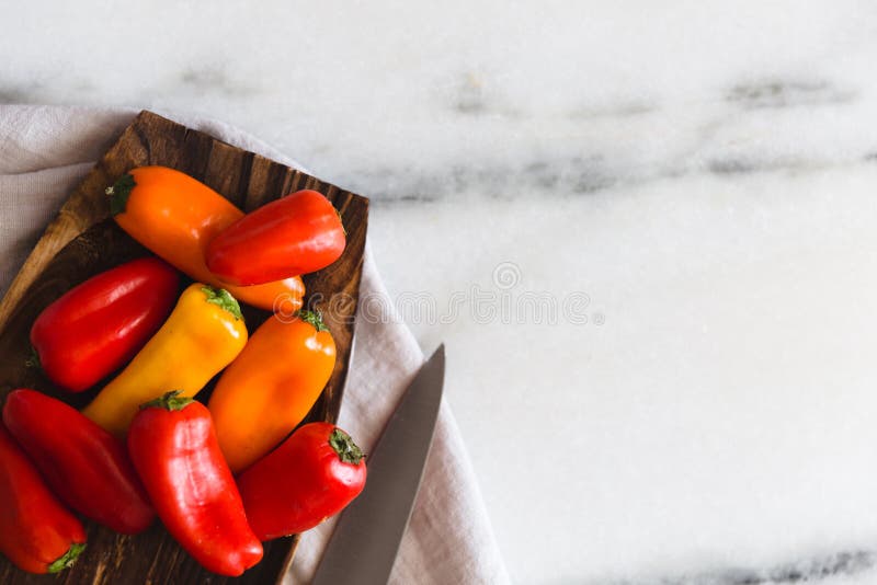 Colorful Tiny Bell Peppers on a Marble Surface Stock Image - Image of ...