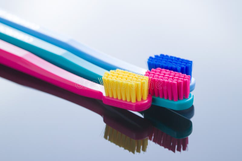 Colorful toothbrushes stock photo. Image of color, breath - 137344468