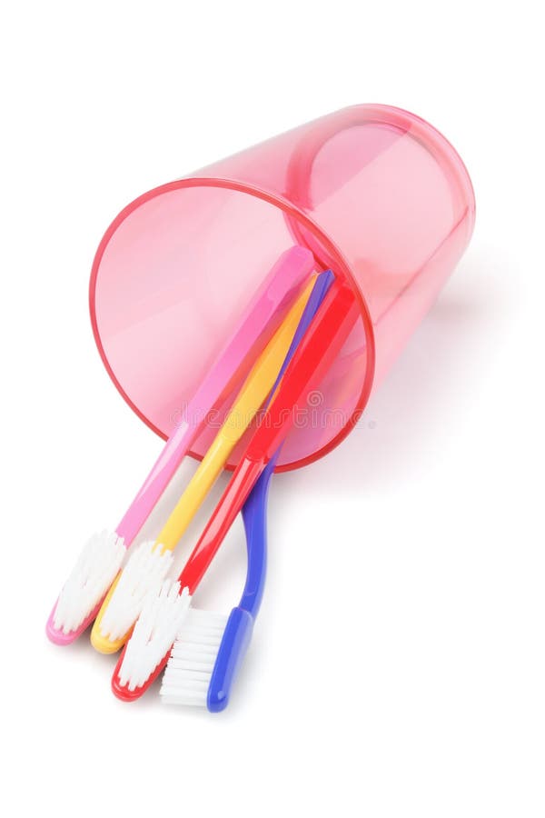 Colorful Toothbrushes in Plastic Cup Stock Photo - Image of white ...