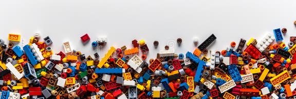 Colorful Toy Bricks Scattered on a White Background. Plastic ...
