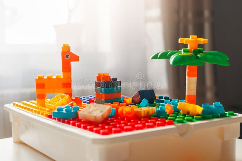 Colorful Toy Structures Including a Giraffe and Palm Tree Built with ...
